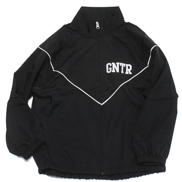 GENERATOR ジェネレーター“ジェネレーター”のMILIS トレーニングジャケット・羽織としてロングシーズン重宝するナイロンジャケット・軽量でタフなナイロンタフタ・ロゴとホワイトラインがスポーティな雰囲気・セットアップのパンツ(grt...