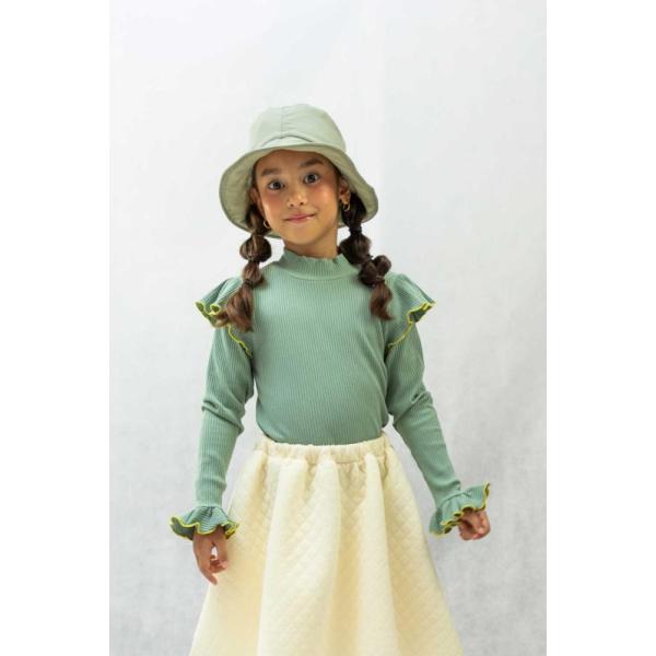 KoQueliKo コキュリコ“コキュリコ”のSelma トップス・肩と袖口にはフリルをセット・配色メロウがアクセントに・重ね着のポイントになる1着・ストレッチの効いたリブ素材のロンT関連キーワード:子供服 キッズ トドラー ジュニア Jr...