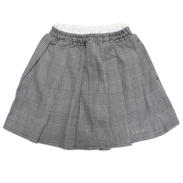 petit main プティマイン“プティマイン”のダブルウエストプリーツスカート・シックな雰囲気のプリーツスカート・裾にラメ刺繍でブランドネームをセット・ウエストが重ね着風になった特徴的なデザイン・トップスをセットインしてベルトを見せる着...