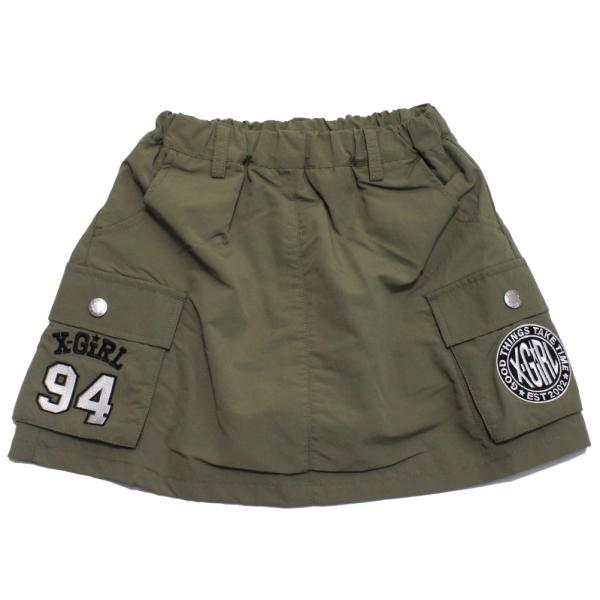 X-GIRL STAGES エックスガールステージズ“エックスガールステージズ”のロゴ刺しゅう カーゴスカート・インナーパンツ付きのヒザ上丈のスカート・サイドのフラップポケットにはロゴ刺繍をプラス・表地はハリのあるナイロン素材・足さばきがし...