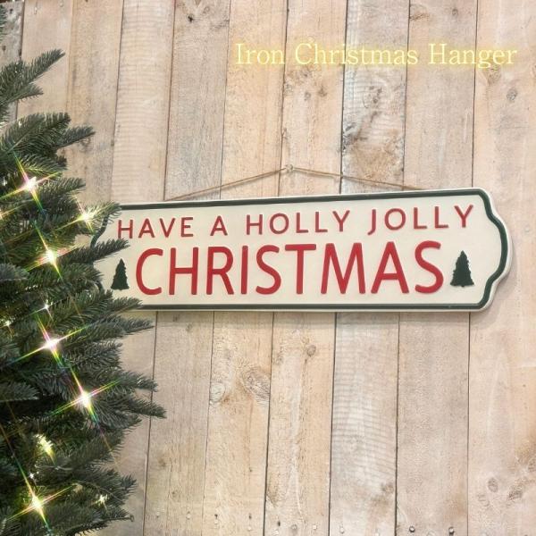 アイアンクリスマスハンガーシンプルながら存在感のあるアイアン製のクリスマス壁掛けサインボード。「HAVE A HOLLY JOLLY CHRISTMAS」のメッセージとツリーシルエットが、温かみのあるホリデームードを演出します。レンガ壁や木...