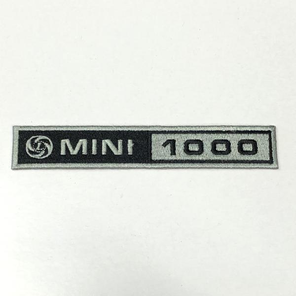 ローバーミニの1000ccのリヤについているエンブレムと同じ柄のワッペンです。2.3cm×13.6cmアイロンで貼り付けることが可能です。裏に糊がついていますClassic Mini Cooper Rear Boot Emblem Badg...