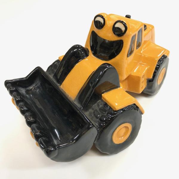 ニコニコ顔のついたホイールローダーの陶器製のオブジェです。14cm×24cm×13cm古いものです。写真のものが現品です。loader　はたらくくるま　重機のミニカー　ローダー