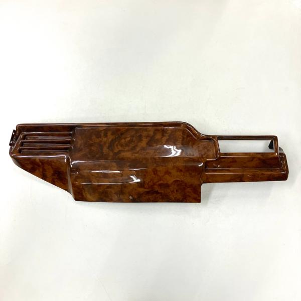 こちらは1点限りです。写真のものが現品です。クラシックミニ（ROVER　MINI）専用内装パーツです。新品純正のシステムダッシュボードをウッド風にペイント仕上げにしたタイプです。ウッドメーターパネルの車両などには良く合うと思います。付属品は...