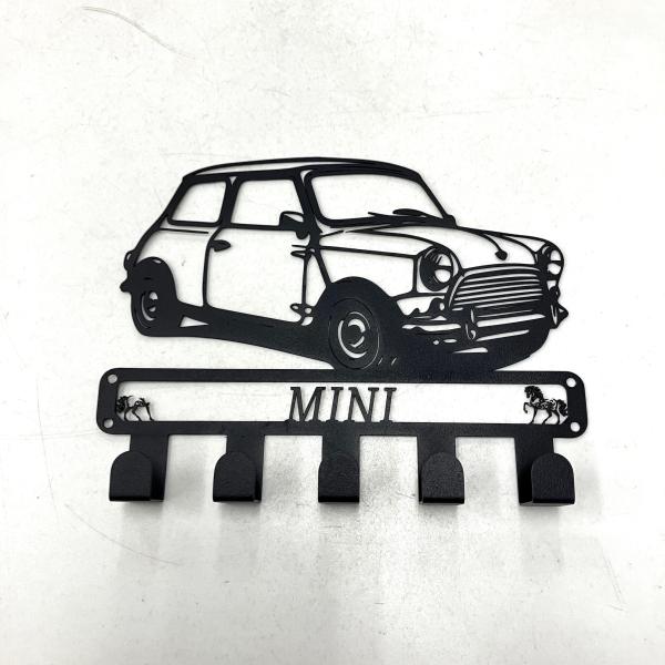 クラシックミニのかわいいウォールフックです。クラシックカー好き、ローバーミニ好きの方へおすすめです。本商品を壁や棚に固定し、フックにハンガーや洋服などをかけて使用するフックです。25cm×19.2cm固定金具は別途ご用意ください。写真のもの...