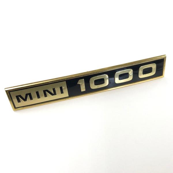 ゴールドメッキされた、1970〜76年のローバーミニ1000cc用のリプロダクションパーツです。MINI1000のデザイン3本爪の差し込み式タイプです。Classic Mini 1000 Gold Rear Boot Badge Emble...