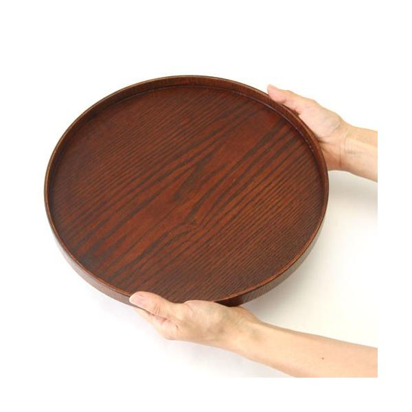 ■商品説明おもてなしに最適なベーシックな丸盆。手になじむ天然木の温もり。気品あふれる木製のお膳です。丸盆でお茶出しに使いやすい大きさです。仕上げには漆塗りを施していますので、耐久性にも優れ、お店を営まれている方にもおすすめです。ご家庭では、...