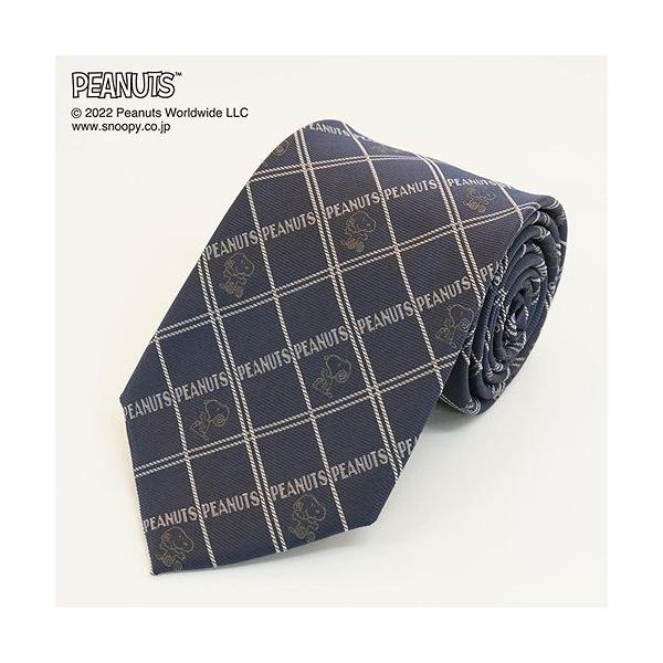 スヌーピーの柄で可愛らしくデザインされた、スーツに合わせ易いネクタイです。ピーナッツ／ネクタイ　(スヌーピー：チェック柄)チェック柄にスヌーピーがさりげなくデザインされていますので、ビジネスシーンでも問題なくコーディネイトできます。小剣には...