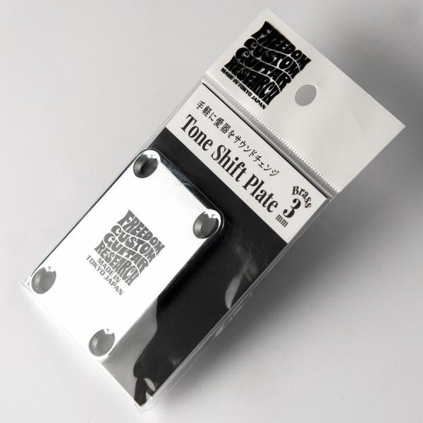 フリーダムのネックプレート。電気的にではなくギター自体の鳴りを改善するお役立ちアイテムです！！