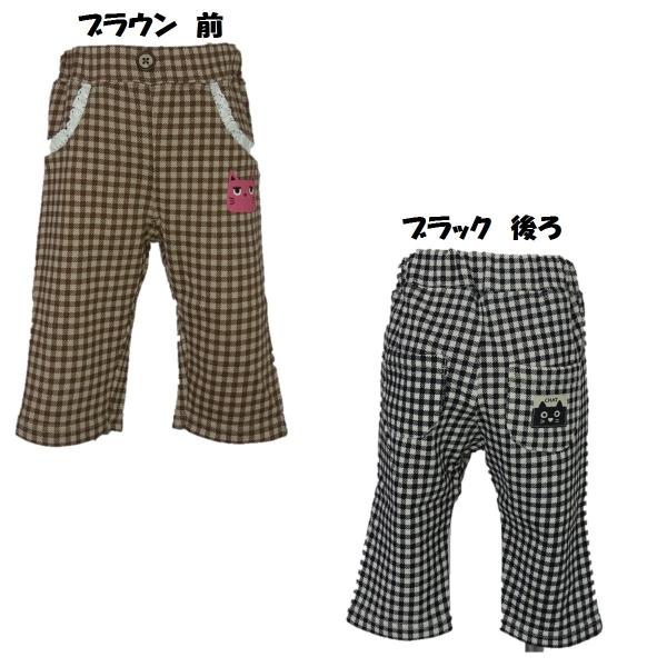 UZUCHAT(ウズチャット）の格子柄チェックプリント七分丈パンツです。前ポケット2つとボタンはフェイクです。ポケット周りにレースが施されています。左ポケット下にネコプリント、後ろポケット部分にはネコのワッペンがついています。うしろポケット...