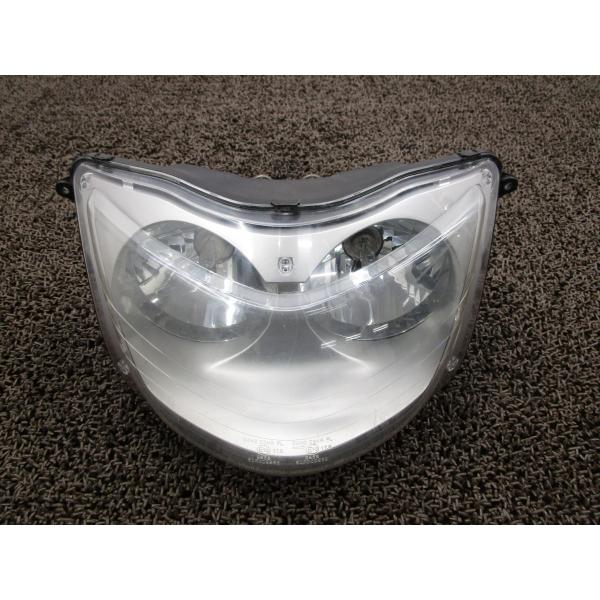 マジェスティ250C　ヘッドライト商品説明使用感等に伴うキズございます。レンズに汚れ、曇りございます。バルブの留める金具が片方欠品しております(画像9枚目参照)。欠けございます(画像10枚目参照)。商品の状態は、画像にてご確認下さい。修復素...