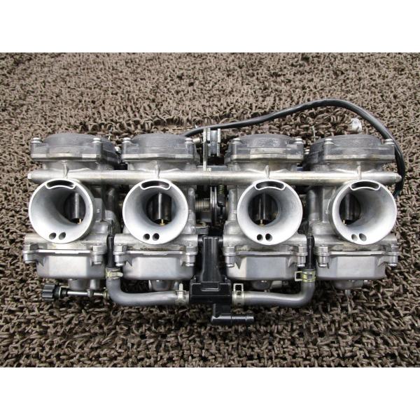 FZ400　キャブレター商品説明始動確認済み車両からの取り外しとなります。使用感等に伴うキズございます。1番のフロートチャンバー固定ネジ穴に削れございます(画像8枚目参照)。画像9枚目に欠けございます。ピストン固着は見受けられません。商品の...