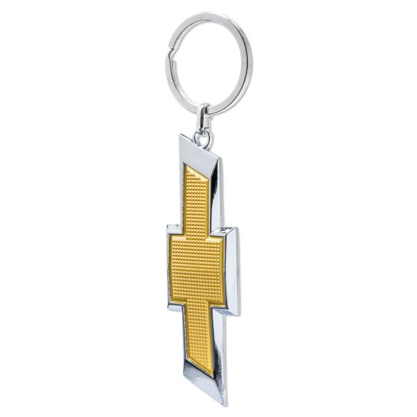 こちらのアイテムは現在品切れ中となっております。Chevy Gold Key Chainシェビー ゴールド キーチェーンChevrolet ロゴのキーリングです。サイズ: 約 8cm x 2.5cm(リング含む全長 11.5cm)