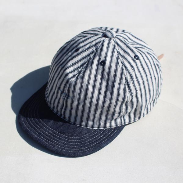 HIGHER/ハイヤー 9oz HICKORY × DENIM BRIM CAP A（WHITE STRIPE）ハイヤーより本体に9oz HICKORYとブリムに DENIM使った６枚パネルのキャップ。異なる2トーンの素材感を活かした雰囲気...