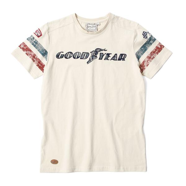 グッドイヤーのオフィシャルライセンスTシャツ。サンドカラーをベースに、グッドイヤーのロゴと、両袖にあしらわれたブルーとレッドのダブルストライプがあしらわれたことで、全体的にヴィンテージ感漂うデザインにまとめられています。