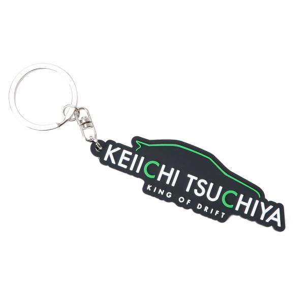 土屋圭市公認による、モトーリモーダオリジナルのラバーキーホルダー。AE86のサイドシルエットをモチーフにしたKEIICHI TSUCHIYAのロゴをキーリング化。ボディや樹脂パーツなどに与える擦り傷の軽減を目的に、ラバー（シリコン）素材を採...