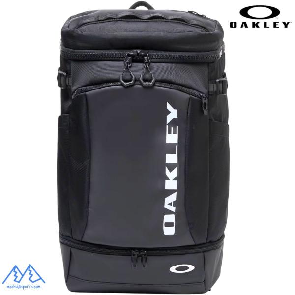 OAKLEY Enhance Hybrid Backpack L black white耐水性の高いコーティングポリエステル素材と耐久性の撥水ポリエステル素材を組み合わせたボックス型バックパック。メイン収納以外にシューズなどの大きい荷物が収...