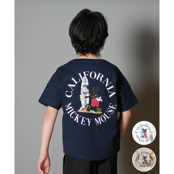 【シルエットもkawaii!ミッキーTシャツ】●夏らしさ全開の、サーフボードを持ったミッキーをプリント。●センター部分が少し長めのデザインシルエットがカワイイ!!≪商品詳細≫■素材■コットン■サイズ目安■【130cm】身幅：41.5cm  ...