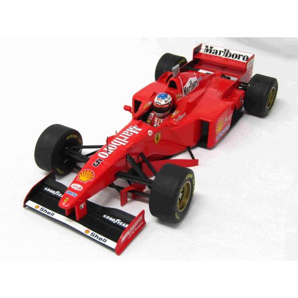 1/18フェラーリF310B用タバコロゴデカールです。デカールのみです。元のデカールは硬化していたので爪楊枝の先端切ってノミの様にして削り落とします。ドライバーカメラはオフセット印刷なのでシンナーかコンパウンドで落とします。貼付見本はコンパ...