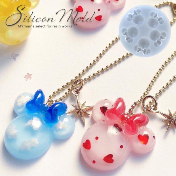 シリコンモールド立体 リボンネズミ モチーフ#ゆうパケ16点可頭にリボンを付けた可愛いマウスの形のパーツが出来るシリコンモールドです。お花やホログロム等を封入すれば一気に可愛いモチーフに仕上がります。ピンバイス等で穴を開けて、ヒートンを付け...