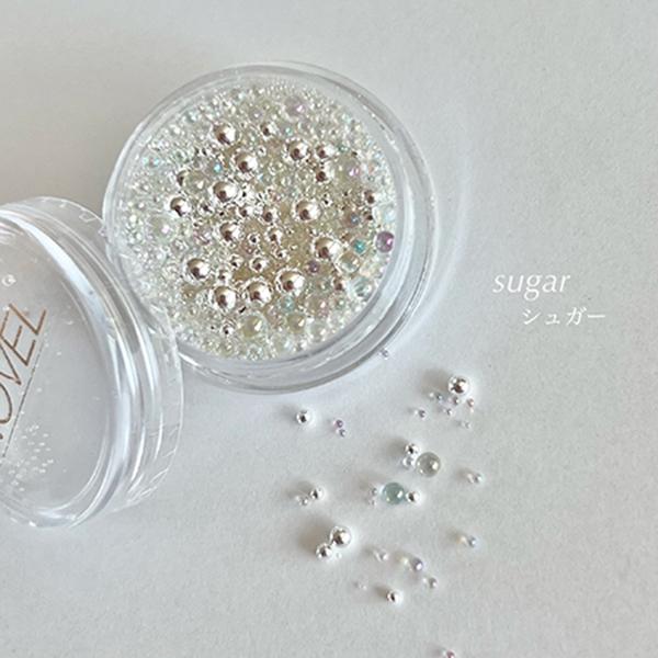 ランダムなサイズのクリアボールとブリオンがmixされたパーツです。他のパーツと組み合わせたり、全面や数個散らしても個性的に仕上がり、多種多様にお使いいただけます。パステルカラーの色味で弾けるような可愛らしいキャンディのようなわくわくするアイ...