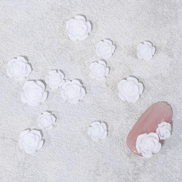 繊細なバラの形のパーツです。置くだけでアートが仕上がります。寸法：大 8ｍｍ×8ｍｍ×4ｍｍ　　　　小 6ｍｍ×6ｍｍ×3ｍｍ※ひとつひとつ手作業の為、大きさや形、色味に個体差があります。あらかじめご了承ください。８ｍｍ×６個、６ｍｍ×６個