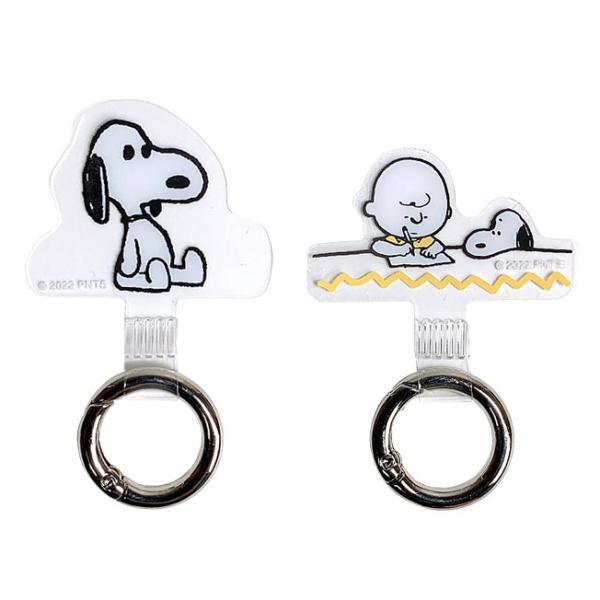 ピーナッツ マルチリングプラススマホケースの中に挟むだけでマルチに使えるスマホアクセサリです。リングに指を通すことでスマートフォンの持ちやすさを向上し、落下を防止します。リング部分を持ち手にして持ち歩いたり、カバン・ベルトループ等に取り付け...