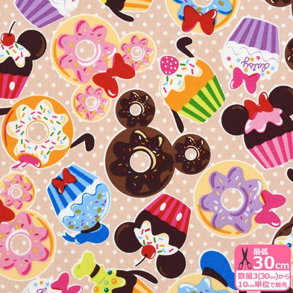 ミッキー＆フレンズより ミッキーたちのドーナツやカップケーキなど、ポップで可愛らしいモチーフがいっぱいのスイーツ柄プリント生地です。●このプリントは契約により製品化して販売することは禁じられております。素材：綿100％/オックス/規格：約1...