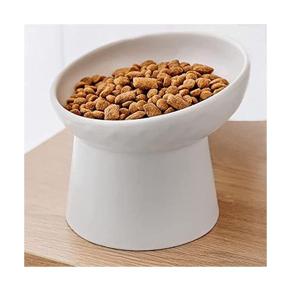 パッケージ個数:1・15°傾斜設計で頸椎を保護商品サイズ：幅13cm x 奥行13cm x 高さ11cm商品重量：440g。猫皿は猫の自然な姿勢に基づいて、15°傾きのように設計され、食事中の首や腰の負担を軽減し、食事をサポートします。快適...