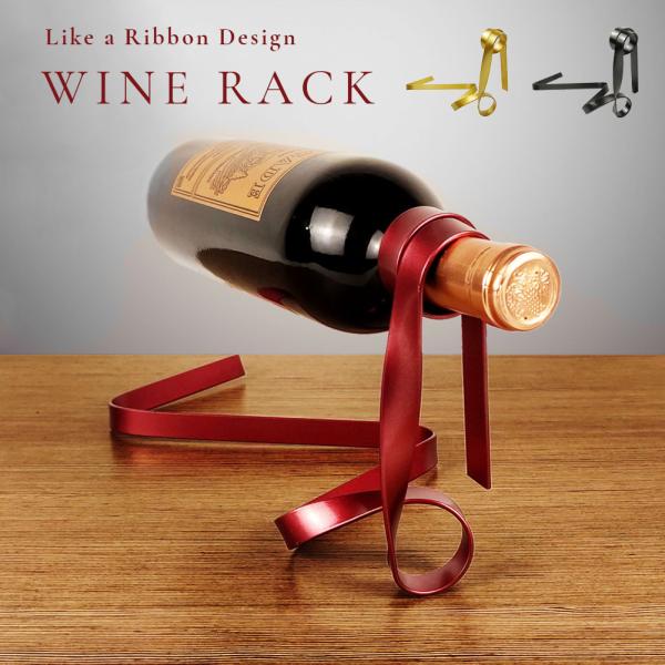 サイズ(約)34×16×15cm素材／材質アイアン(鉄)色レッド(赤色)系/ゴールド(金色)系/ブラック(黒色)系商品説明まるでリボンが支えているかのようなユニークなワインラック。置くだけでインテリアに魅せるデザイン性と美しい光沢感がお部屋...
