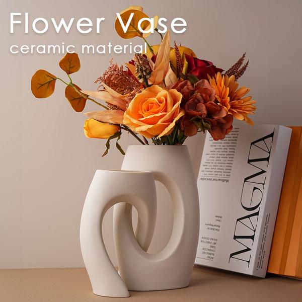 サイズ サイズスペックは画像に記載素材／材質 陶器(セラミック)色 ナチュラル商品説明 セラミック製の2つ花瓶が繋がっているユニークなデザイン。まるでオブジェのような見た目から、お部屋の雰囲気を高級感ある様相へとグレードアップいたします。ま...