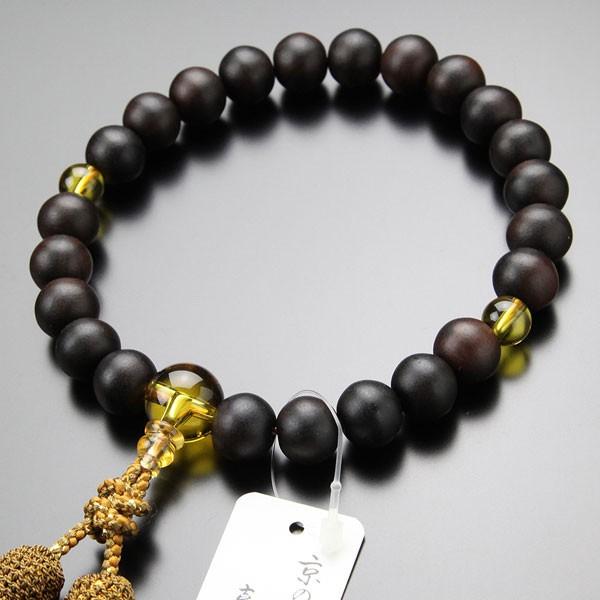 京の匠喜芳工房が作りだす男性用の数珠。素材は縞黒檀と黄水晶。念珠ドットコムは数珠専門店として、京都の職人が丹精込めて作り上げた、本物の京念珠を迅速に全国へお届けしています。