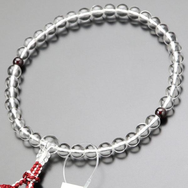 すべての宗派のお客様にお使い頂ける女性用のお数珠でございます。 素材は、輝く透明感が美しい水晶と、1月の誕生石であるガーネットをアクセントに添えました。 ガーネット独特の、やや紫を帯びた深い赤色がとても女性的な印象を放ち、上品で美しく、大変...