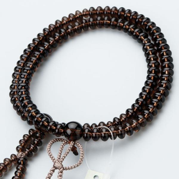 浄土真宗、女性用の正式なお数珠でございます。素材は、落ち着いた風合いが魅力の茶水晶でございます。なかでも、色合いと透明度のバランスが良い、上質の茶水晶のみを使用させて頂いております。さらには、手間と技を要するみかん玉加工を施し、丸玉にはない...