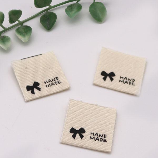 ( ラベル ) キュートリボン コットンラベル（2個） │ 【 商用利用可 】+入数：2枚+販売サイズ： 2cm x 4cm+素材：コットン