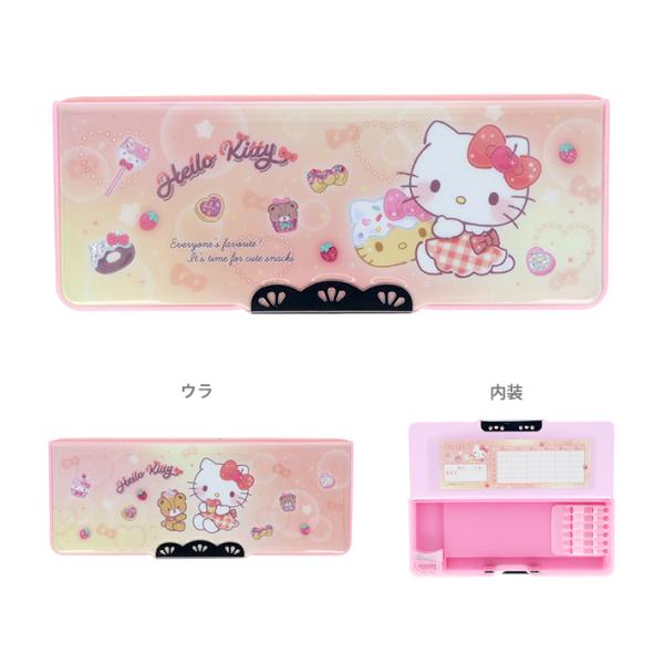 ハローキティからキャラモチーフのスイーツやスナックを使用した心ときめくデザインのヨコピタが登場！表面は鉛筆6本とお名前ペン、消しゴムが収納できるスペース、裏面には定規などがピッタリ収納できる両面タイプの筆箱！もこもこした形がかわいい留め具は...