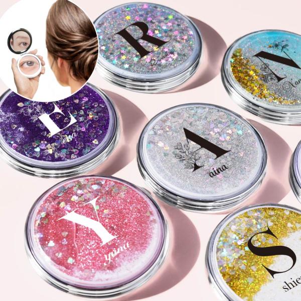 通常の鏡と拡大鏡がセットになった、丸型 グリッター コンパクト ミラー。ハンドバッグに入れて持ち歩きやすいスリムなミラーです。日中いつでも細かい部分までメーク直しができます。簡単なメーク直しのときには通常の鏡を、細かい部分を正確に仕上げるに...