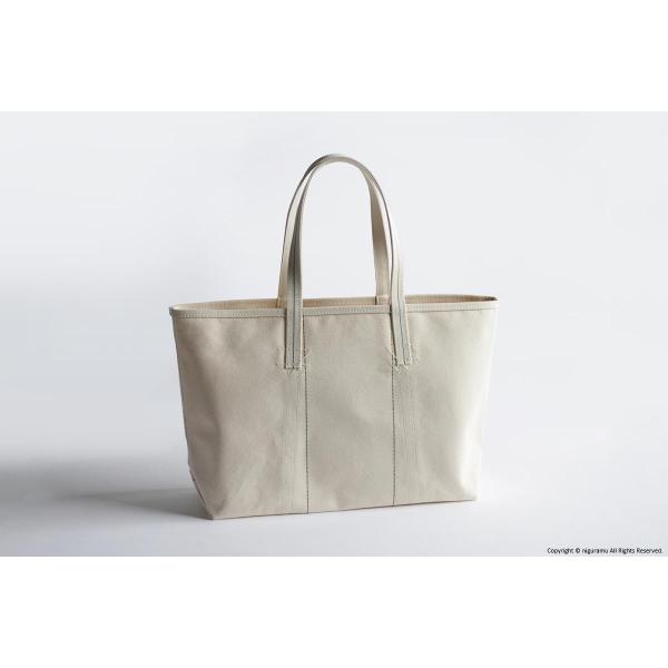 サイズ / Medium ：560"W × 340"H × 150"D mm (持ち手は含まない)重量: 590 gハンドル: 560"L mm材質：綿100％ (本体:4号帆布, ハンドル:ヘリンボンテープ, ハンドル内:11号帆布)