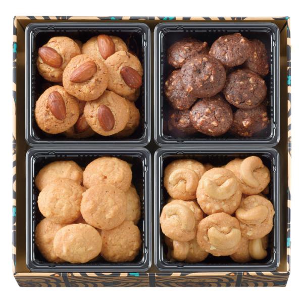 【商品説明】一粒一粒にローストナッツを練り込んだ香ばしいクッキー。サクサクした食感に焼き上げ、ナッツ特有の味わいを引き出しました。モロゾフが誇るロングセラーです。【内容】チョコレートチップ・カシューナッツ・マカダミアナッツ・アーモンド×各4...