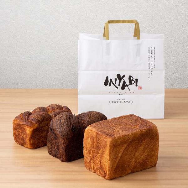 高級デニッシュ食パン「MIYABI(ミヤビ)」です。3種類のパンを詰め合わせてお届けします。トランス脂肪酸量0g、保存料不使用。ミヤビパンの美味しさの特長は「ふんわり」「しっとりもっちり」とした食感。こだわりの材料を絶妙のバランスで配合した...