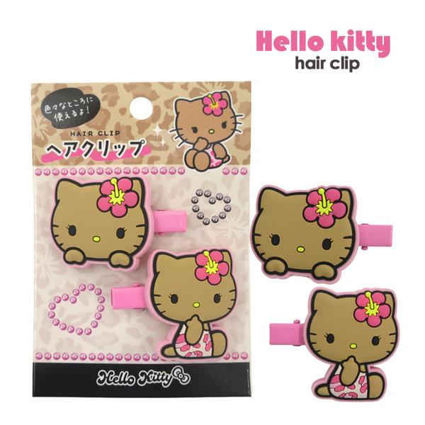 日焼けしたかわいい「ハローキティ」の雑貨シリーズの登場です。こちらは、「ヘアクリップ」です。ヒョウ柄の衣装を着ています。ちょこんと座った状態と顔型の2個1セットになっています。アクセ感覚で髪の毛にピタッと！カバンにつけたりノートのクリップに...