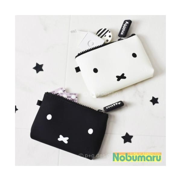 ミッフィーフェイスの小物入れ♪・ホワイト・ブラックシンプルなデザインなので大人も子供も持てるデザインです！柔らかなシリコン素材のジッパーポーチ。リップやヘアゴムなどの小物や小銭入れにも！サイズW14.0×H9.5×D2.0cm【メール便発送...