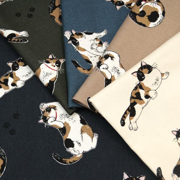 生地は50cm単位での販売になります。ゆうパケット便(メール便)での発送は2.5m(購入数５)まで。商品コード：013-17-cs1504三毛猫Time／オックス生地生地幅110cm／綿100％オックス生地のんびりと自由に生きる三毛猫。そん...