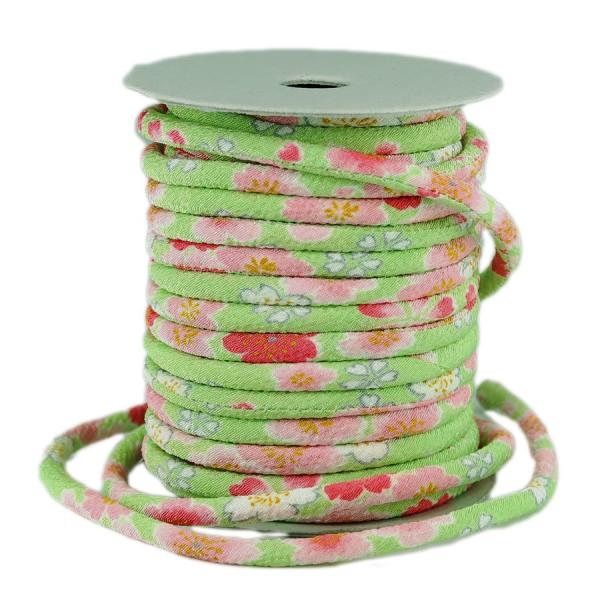 ■表地（ちりめん）：ポリエステル100%　中芯：アクリル100%※10cm単位で販売、価格は10cm分です。数量は10cm単位で入力して下さい(例:1m購入なら数量10)●かわいらしい小桜をあしらったちりめん丸ひも。ふわっとやさしい雰囲気が...