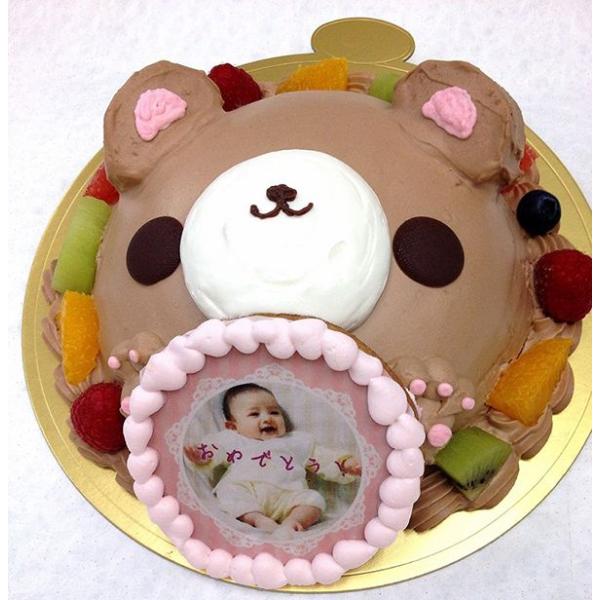 可愛いクマさんが写真をもったケーキです直径15cm 4人〜6人様用