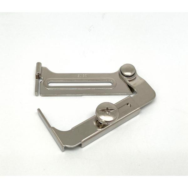 安定したステッチ幅で縫うことが出来るスイング定規。定規を使用しない時は、ガイド部分をずらして使用できるスイングタイプの定規です。ブランド：スイセイ型式　　：　G7E※止めネジは別売りです。