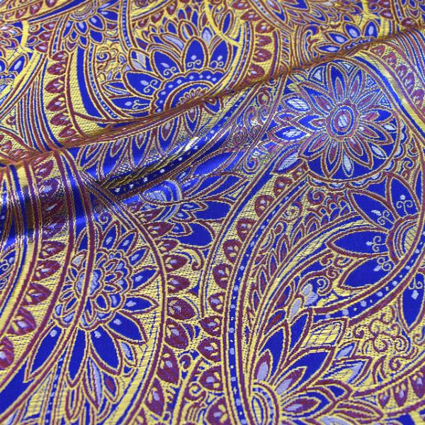 ●素材：ポリエステル60％、ナイロン40％●生地幅：約140cm【生地の特徴】光沢が強く、豪華絢爛でゴージャスなアジアを思わせるような幾何柄のジャガード生地です。薄手ですがやや張り感があり、シルエットがきれいに作れます。ジャケットやドレス等...