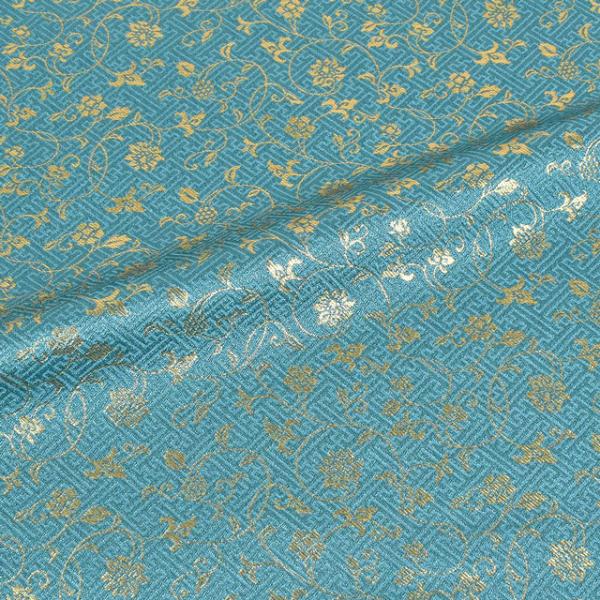 ●素材：ポリエステル100％●生地幅：約70cm【生地の特徴】ハリのあるしっかりとした帯地です。サヤ形の地模様にラメ糸で草花模様が織られています。【お手入れ】お洗濯はできません。衣料用に使用される場合はご注意ください。※製造の都合上、再入荷...