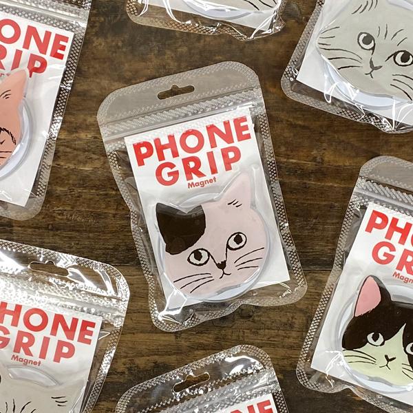 イラストレーター、松尾ミユキさんデザインのスマホグリップです。マグネットが内臓されており、MagSafe対応iPhoneやスマホケースでお使いいただけます。かわいい猫顔モチーフです。指を通して安定感のある操作や落下を防いだり、動画視聴の際は...