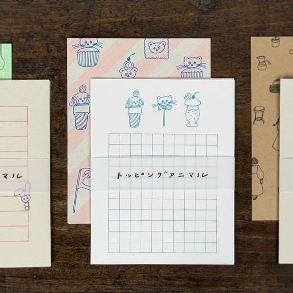 独特な世界観のイラストが魅力的なトビマツショウイチロウさんデザインのミニレターセットです。どの柄も自在ハンコ(クリアスタンプ)の柄を利用しています。便箋を半透明の封筒に入れると柄がふんわり透けて見え、より可愛らしい雰囲気になります。小ぶりな...